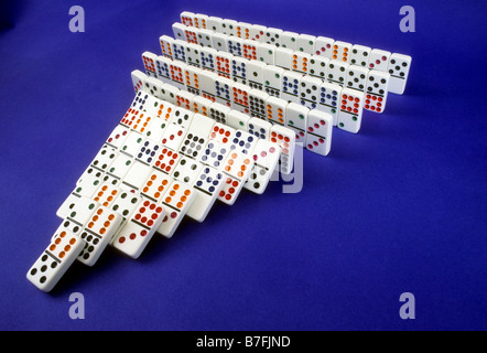 dominos fall increasing size of row each time Stock Photo - Alamy