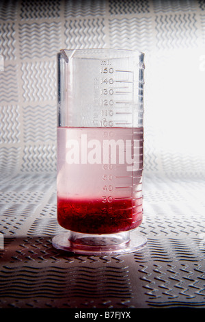 Beaker containing 100 ml of clear liquid and no solids in any form ...