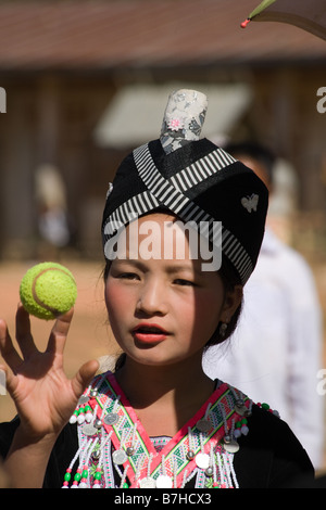 A Hmong New Year ball throwing game on the fairground at Phonsavan ...