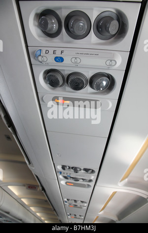 aircraft indoor inside compartment no smoking sign overhead locker ...