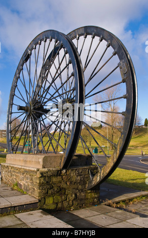 Pit wheel memorial in Rhymney South Wales UK Stock Photo - Alamy