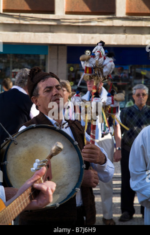 dh FUNCHAL MADEIRA Traditional costumed folk singer with instrument ...