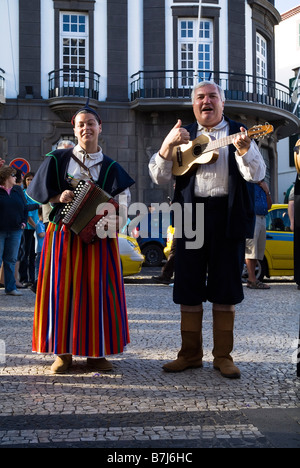 dh FUNCHAL MADEIRA Traditional costumed folk singer with instrument ...