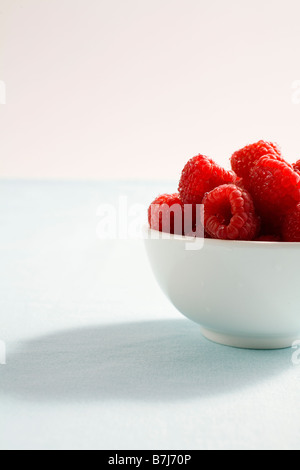 a bowl of red raspberries - still life Stock Photo - Alamy