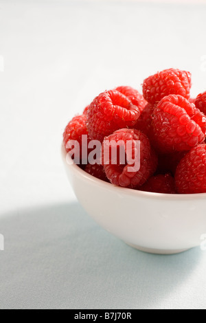 a bowl of red raspberries - still life Stock Photo - Alamy