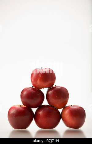 Red apple pile pyramid. Fresh fruit apples isolated on white background ...