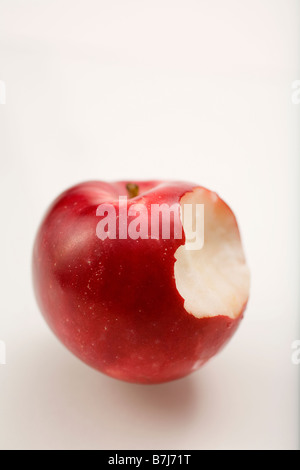 Apple with bite taken out Stock Photo - Alamy
