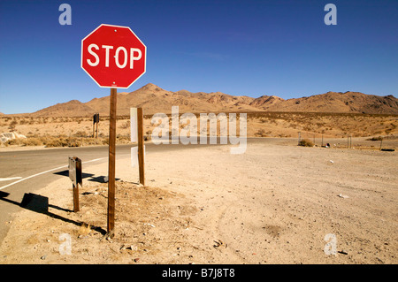 Desert Highway Intersection With Stop Sign, Nevada USA Stock Photo - Alamy