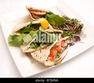 Pitta bread filled with a tuna salad Stock Photo - Alamy