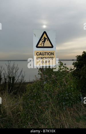 " unfenced cliff sign Stock Photo - Alamy