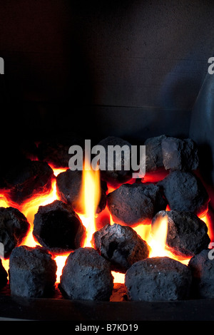 gas fire burning with artificial coals Stock Photo - Alamy