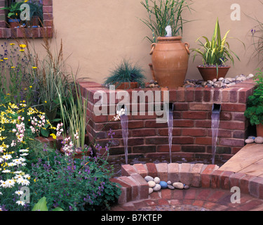MODERN WATER FEATURE WITH WATER SPOUTS Stock Photo - Alamy