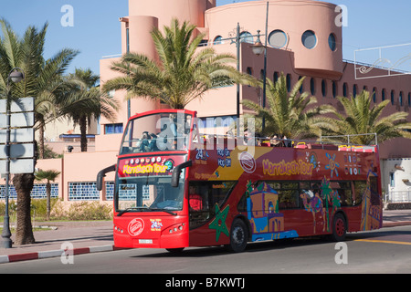 Red tour bus Marrakesh, Morocco Stock Photo - Alamy