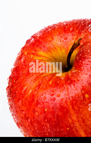 Red apple close-ups cut by mugs on a cutting board Stock Photo - Alamy