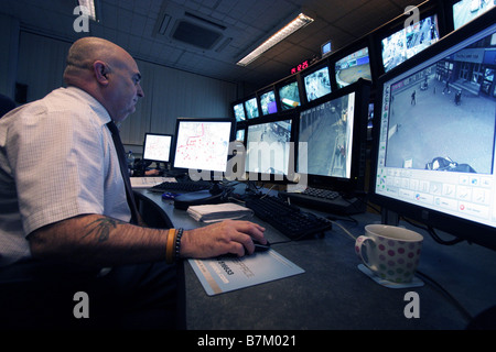 cctv screen. CCTV monitors in control room at Cardiff Central Police ...