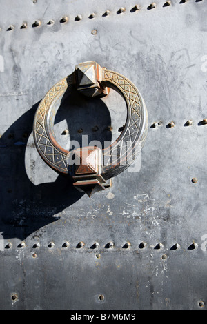 metal ring rivet on metal door Stock Photo - Alamy