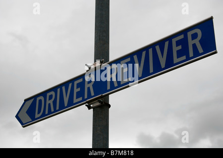 Rest stop and driver reviver road sign with free coffee ahead in front ...