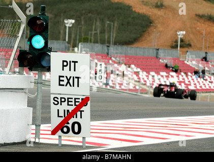 signs displaying speed limit at pit-lane exit of racetrack at Autodromo ...