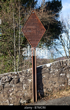 Cast iron sign on a bridge over the River Stour, warning that persons ...