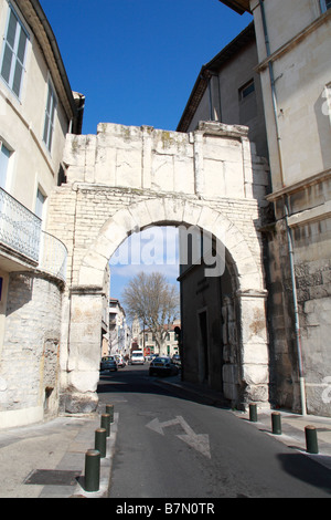 Ancient roman city gate Nimes Porta Augusta Languedoc-Rousillon France ...