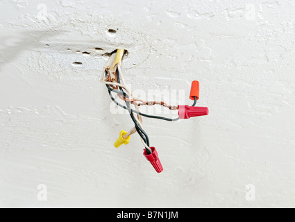 Exposed wires with wirenuts dangling from a hole in the ceiling Code ...
