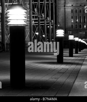 a long row line of street lights and blue sky Stock Photo - Alamy