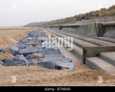 Sea wall at Sea Palling, Norfolk, UK, built as a sea defence to protect ...