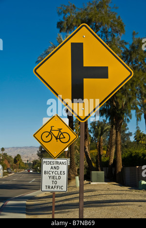 Yellow diamond shape yield sign Stock Photo - Alamy