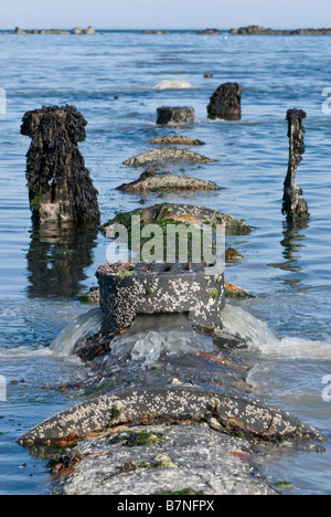 Raw sewage being discharged into shallow sea from the vent in a sewage ...