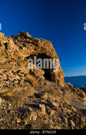 A rock formation with cave at sunrise Pyramid Lake Nevada Stock Photo ...