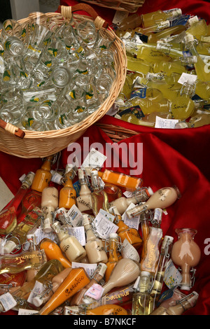 Bottles of Limoncello and Meloncello in a shop window in the town of ...