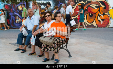 Heraklion / Irakleo, Crete, Greece. People sitting outside cafe in ...