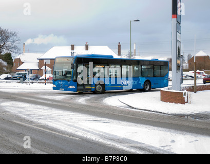Solent Blue line Bus in snowy weather conditions Stock Photo - Alamy