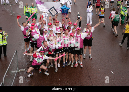 London Marathon Police runners chained together Stock Photo - Alamy