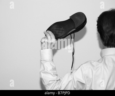 Image portraying the action of throwing a shoe, Arab insult Stock Photo ...