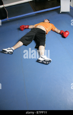 A man knocked down Stock Photo - Alamy