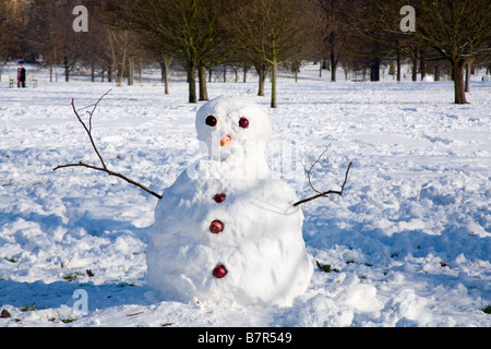 Snowman in a park in London Stock Photo - Alamy