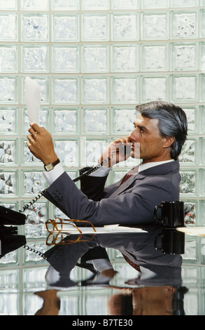 Executives at work in office setting with computer Stock Photo - Alamy