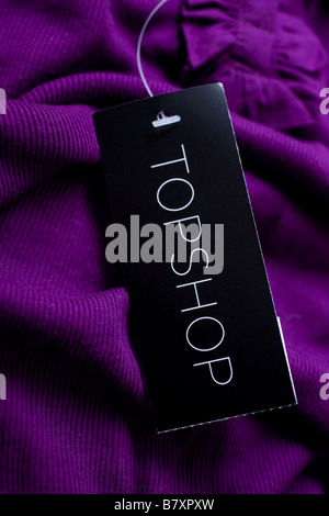 A purple Topshop garment showing the topshop label Stock Photo - Alamy