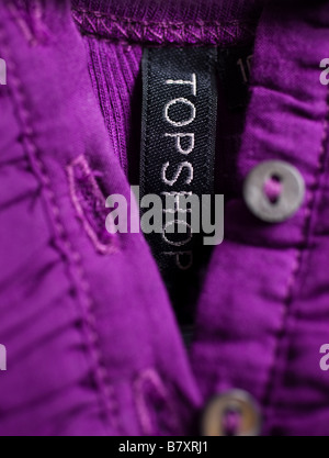 A purple Topshop garment showing the topshop label Stock Photo - Alamy