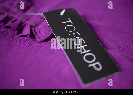 A purple Topshop garment showing the topshop label Stock Photo - Alamy