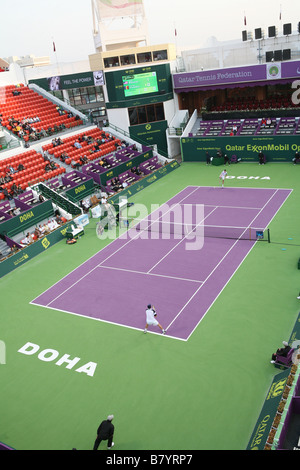 The Khalifa Tennis Stadium in Doha illuminated in shifting colours for ...