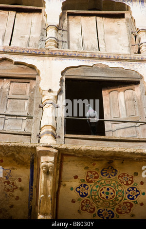 Pigeon sits on Haveli window sill Jhunjhunu Rajasthan India Stock Photo ...