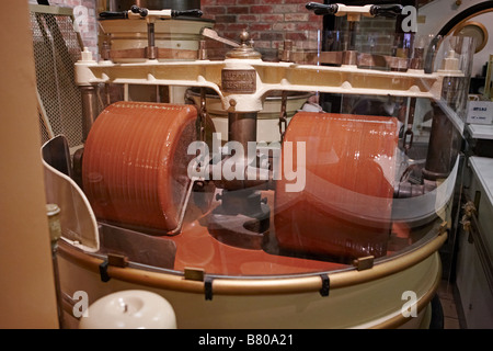 an old fashioned ice cream machine is being used to make this delicious ...