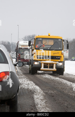 Gritter lorry spreading road salt on ice covered roads in Union Hall ...