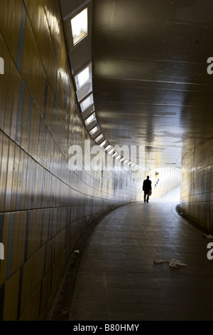 Man walking through an underpass in Tbilisi Stock Photo - Alamy