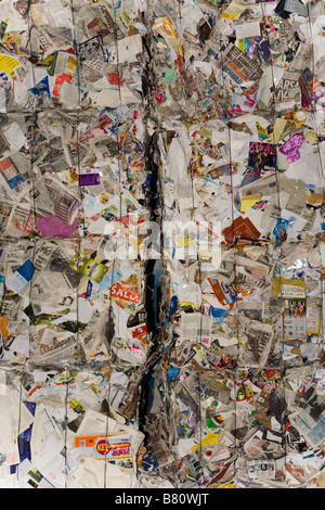 Compressed paper bales at a recycling plant reuse recycle waste ...