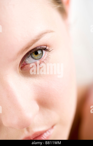 Close up to a young woman s right face side view Stock Photo - Alamy