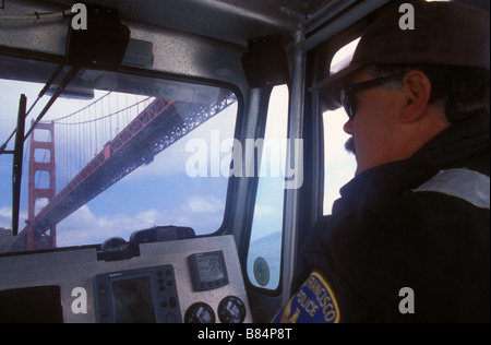 Golden Gate Bridge Police patrol car policeman cop Stock Photo - Alamy