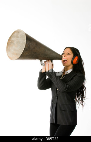 businesswoman shouting down loud hailer Stock Photo - Alamy